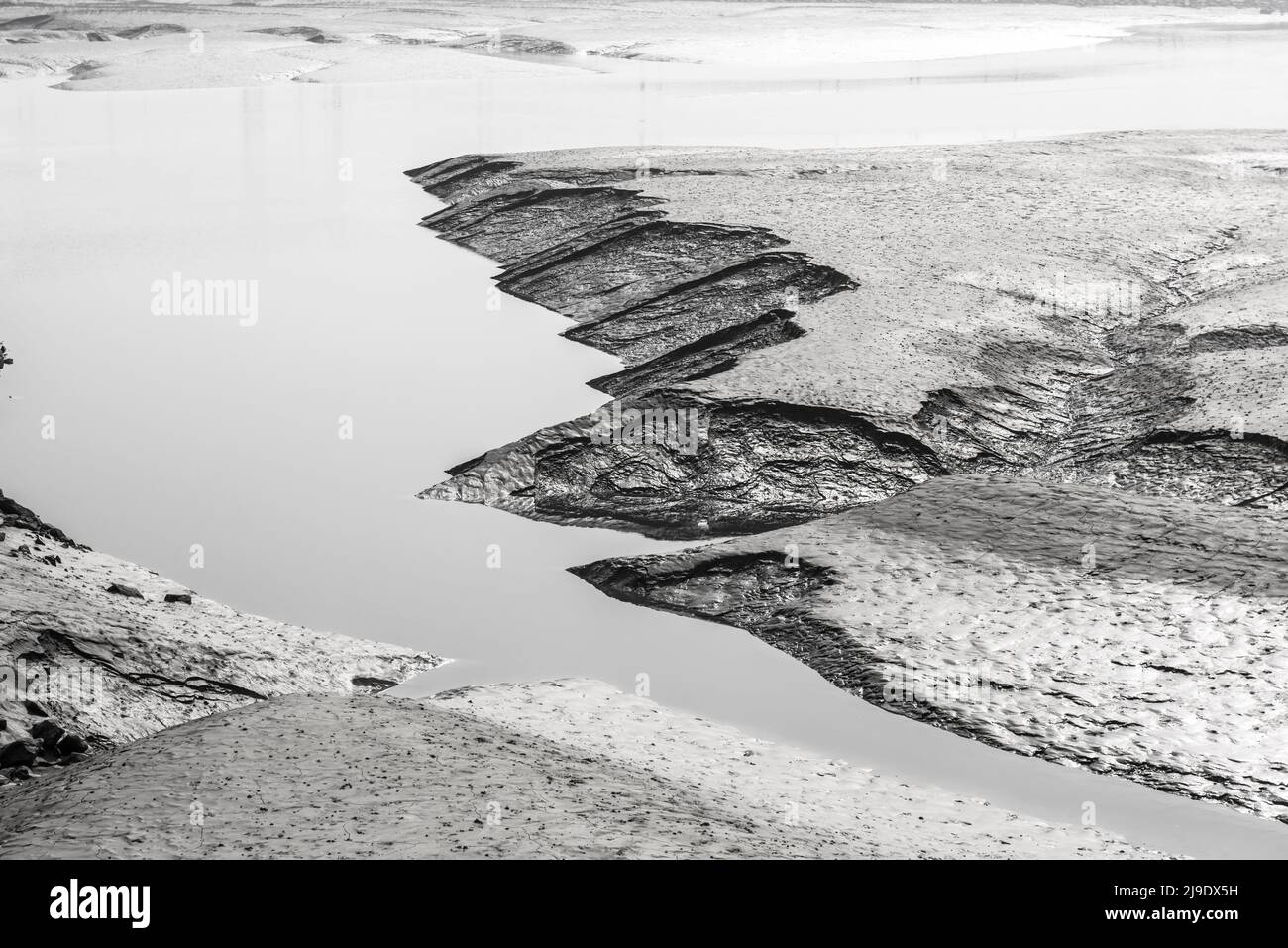 The beautiful and curious tidal mud flat Stock Photo - Alamy