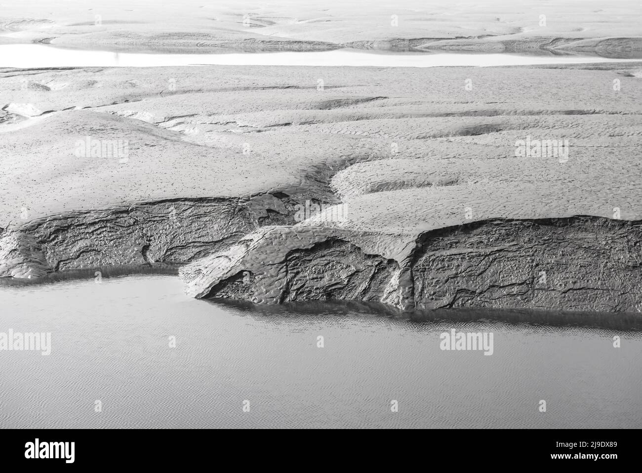 The beautiful and curious tidal mud flat Stock Photo - Alamy