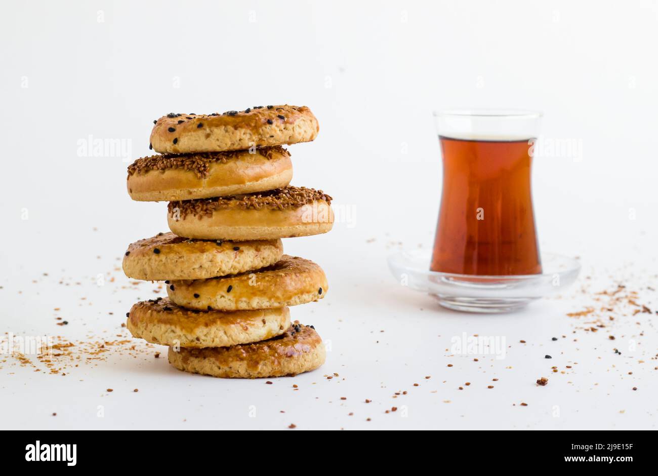 Traditional Turkish Kandil,Sesame Rings stacked with tea on white ...