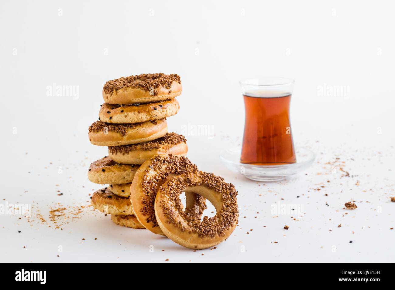 Traditional Turkish Kandil,Sesame Rings stacked with tea on white ...