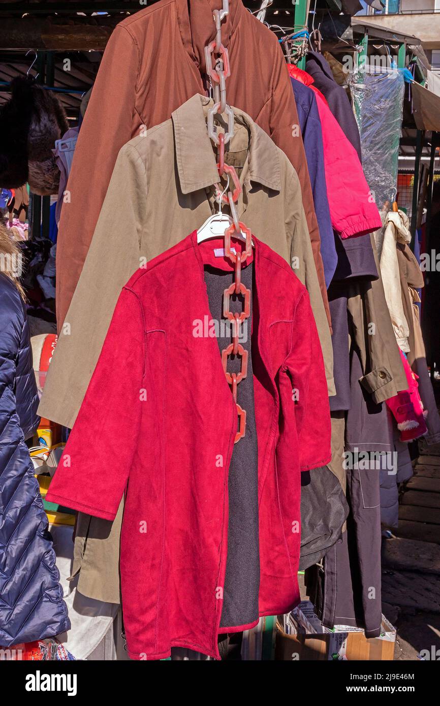Female jackets and coats clothing sold on local market stall Stock ...