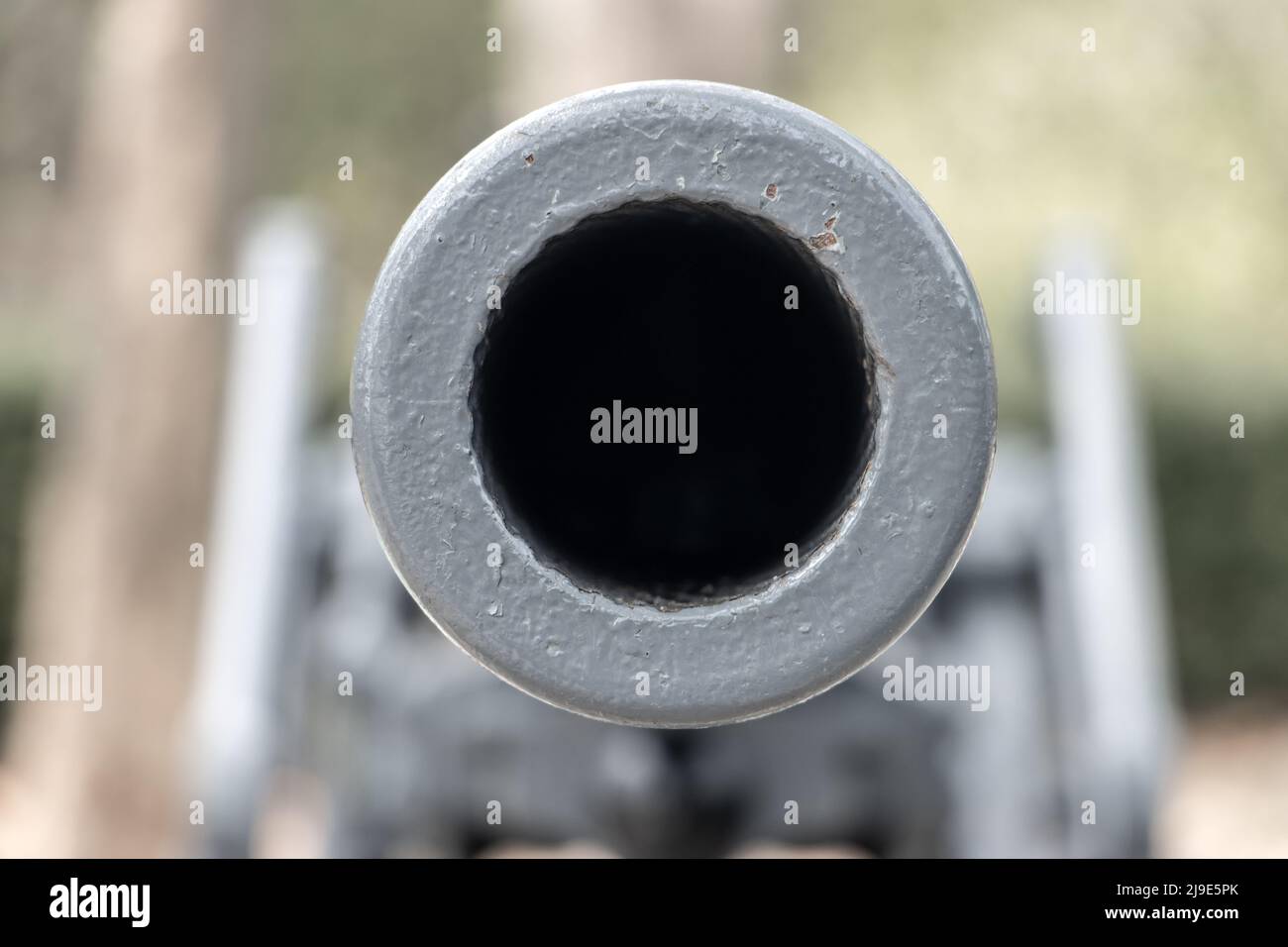 The barrel of the cannon aims front into a camera Stock Photo - Alamy