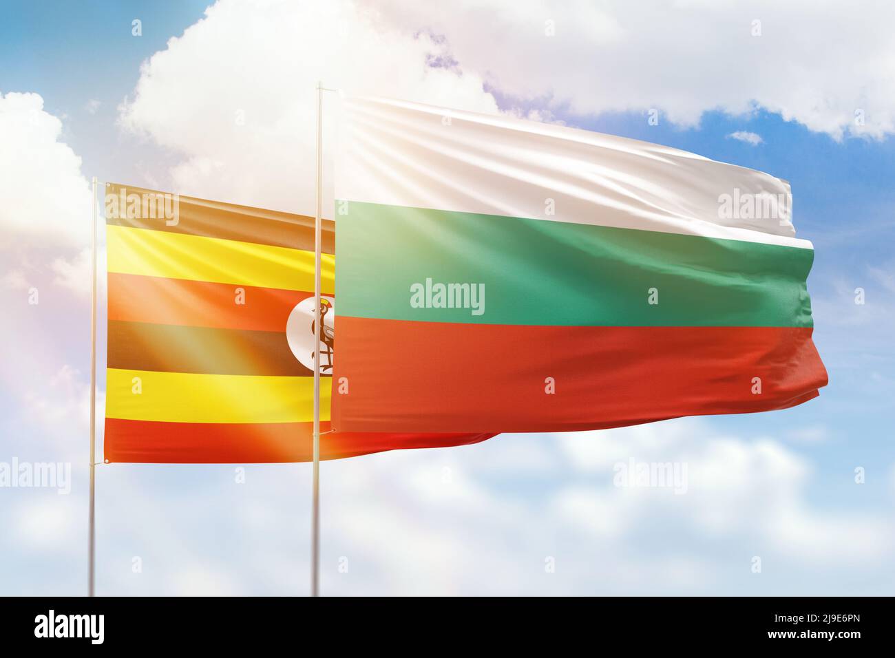 Sunny blue sky and flags of bulgaria and uganda Stock Photo - Alamy
