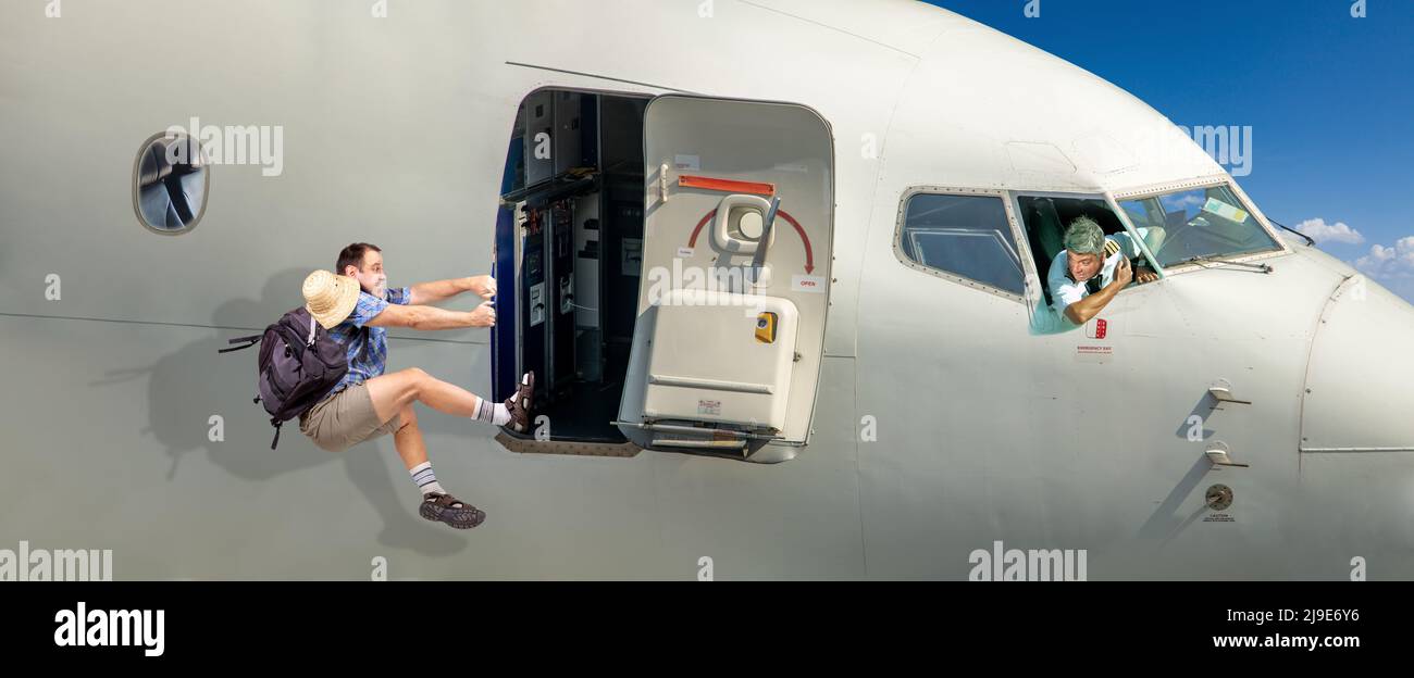 Hiker with backpack holding open door of flying plane Stock Photo - Alamy