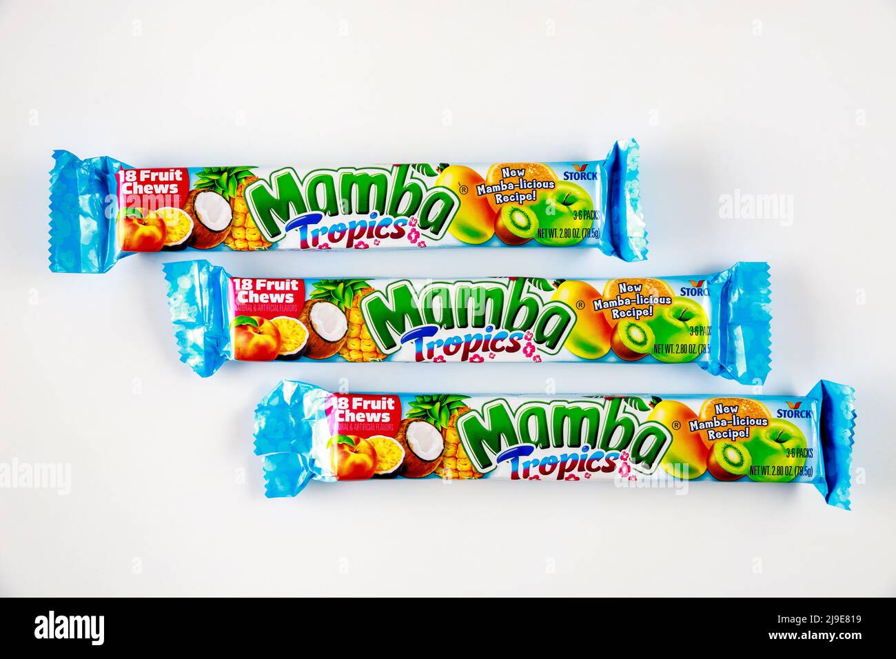 Colorful packets of mamba chewable candy isolated on a white background ...