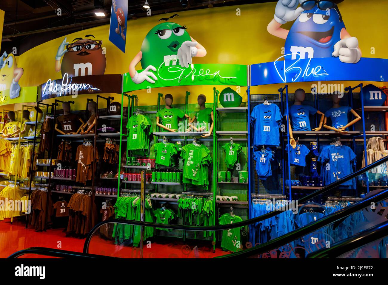 Variety of colored clothes and souvenirs . The MMs store in Manhattan ...