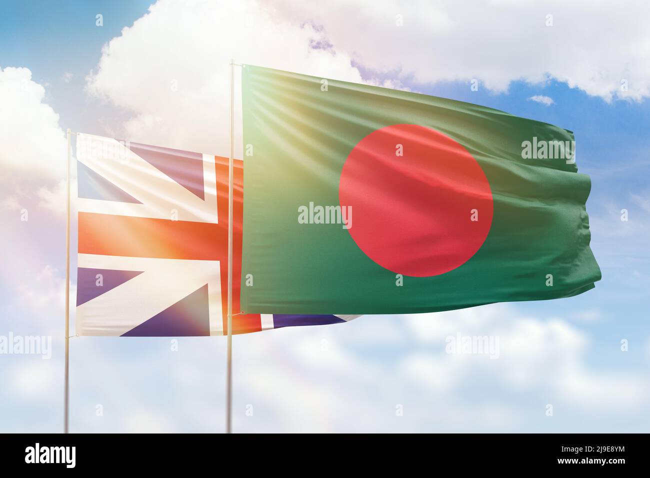 Sunny blue sky and flags of bangladesh and great britain Stock Photo ...