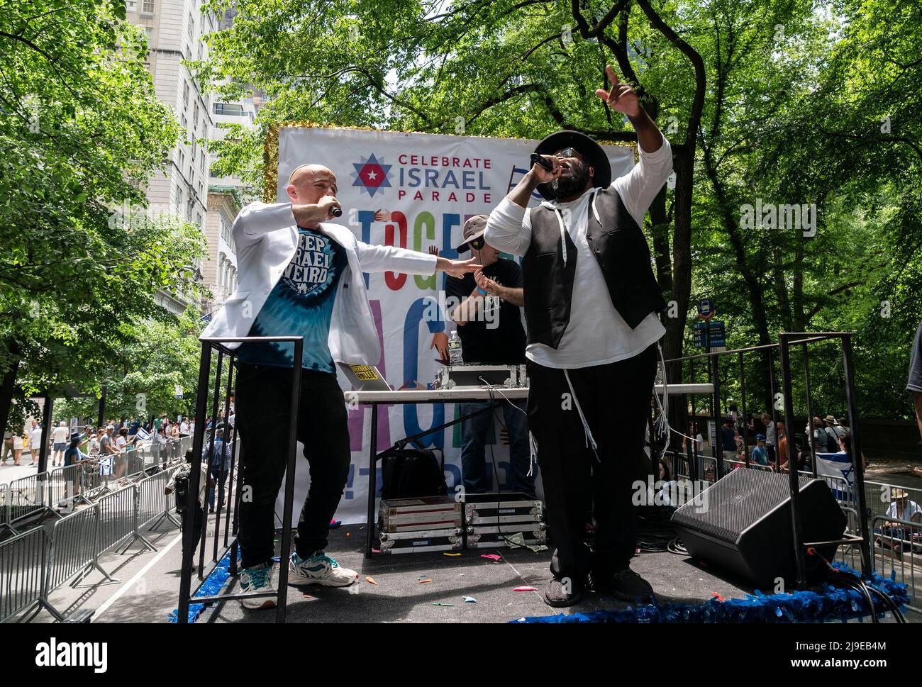 Rapper Kosha Dillz (L) and his group perform during Celebrate Israel ...