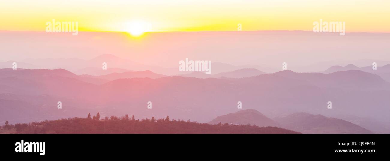 mountain silhouette at sunrise in spring season Stock Photo - Alamy