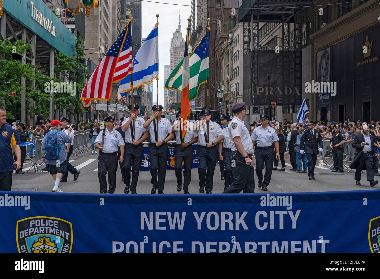 NEW YORK, NEW YORK - MAY 22: NYPD flag squad marches up Fifth Avenue ...
