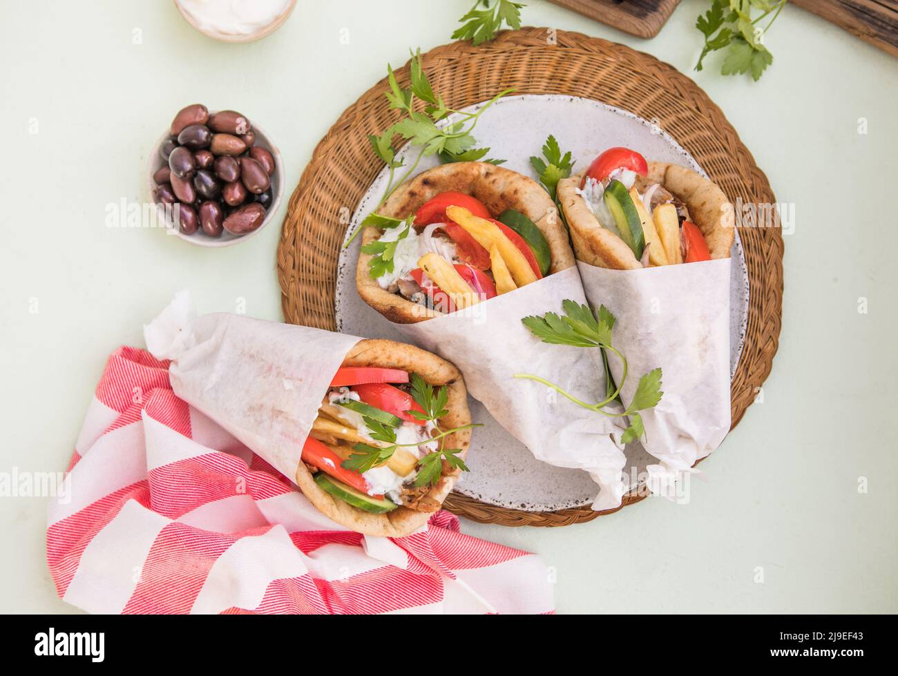 Greek chicken souvlaki ona pita with fresh vegetables with tzatziki ...