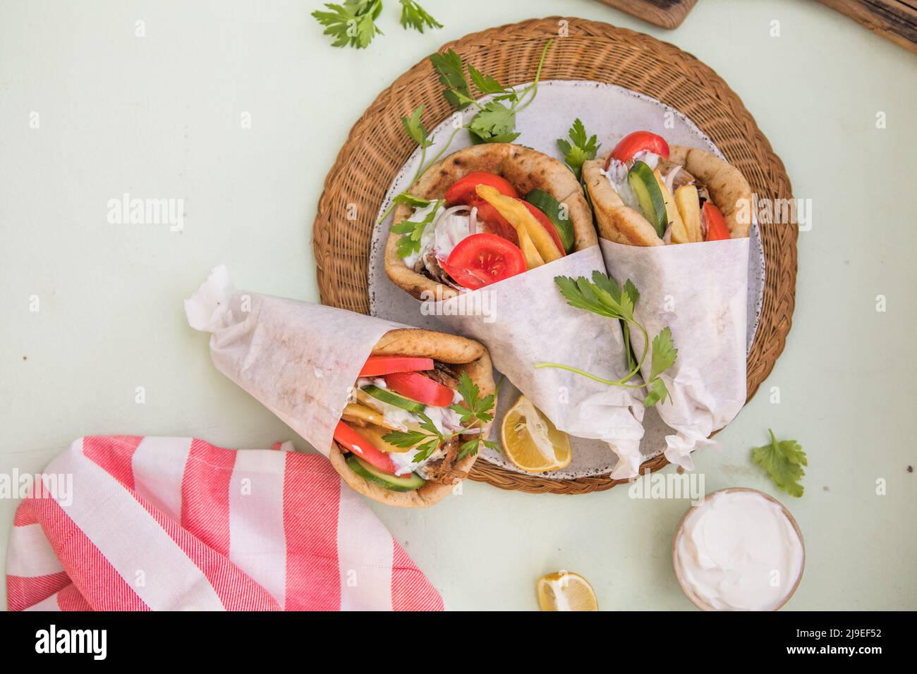 Greek chicken souvlaki ona pita with fresh vegetables with tzatziki ...