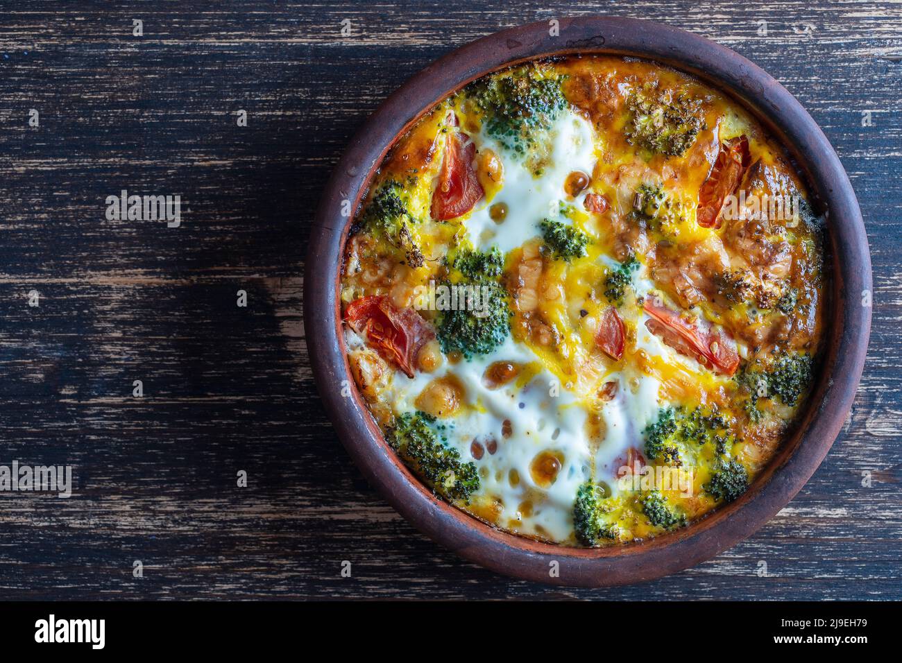 Ceramic bowl with vegetable frittata, simple vegetarian food. Frittata ...