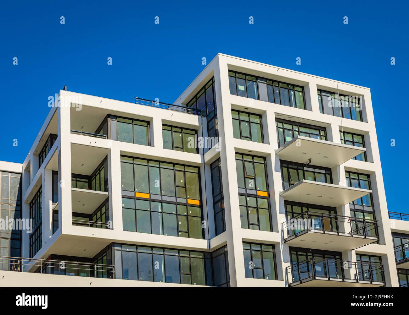 Facade detail of a modern high-rise apartment building. Abstract ...