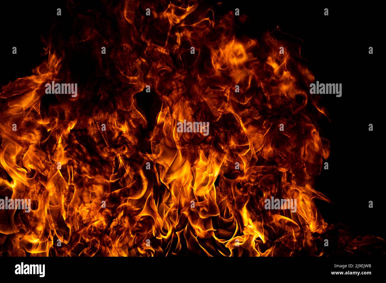 Texture of fire on a black background. Abstract fire flame background ...