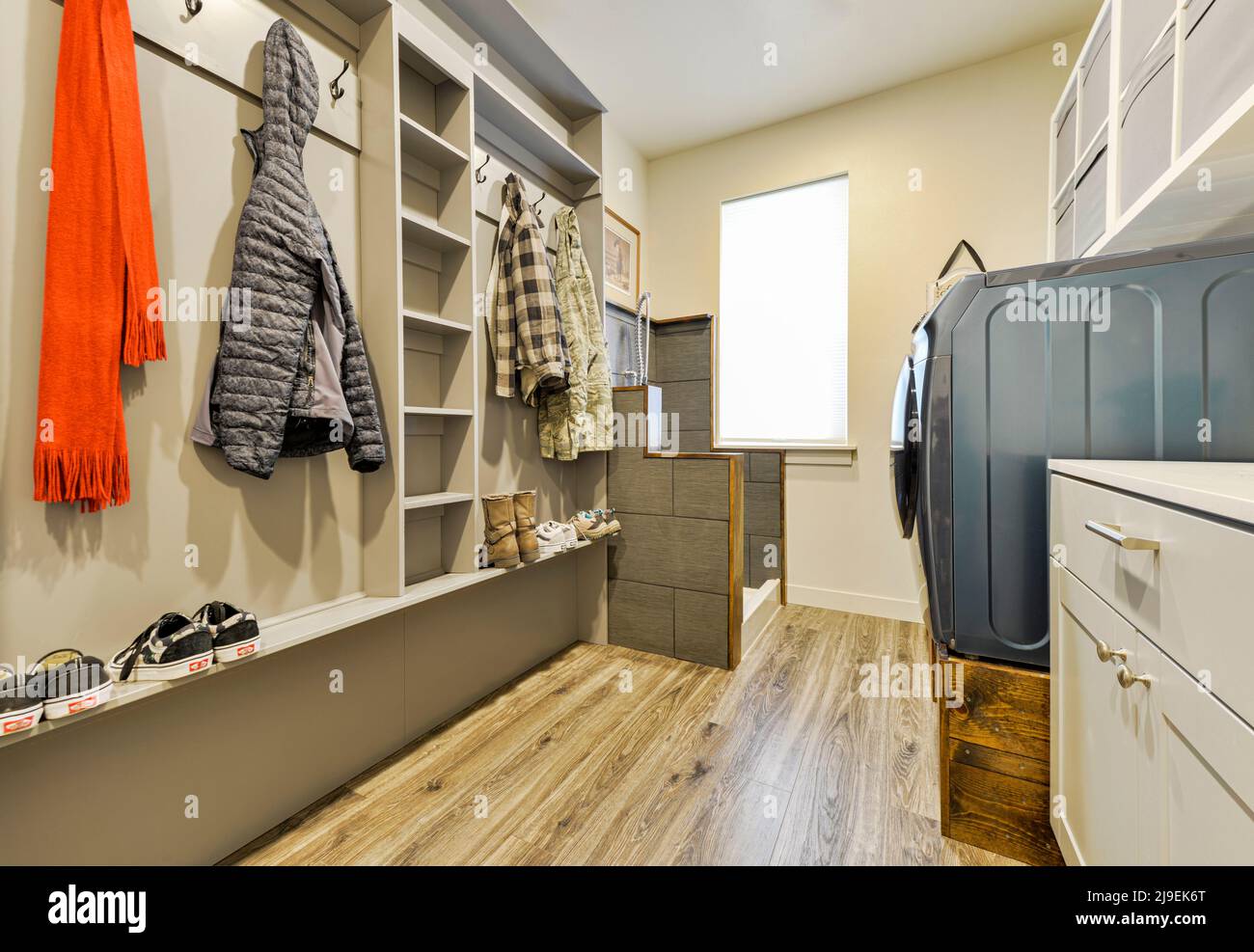 Modern residential laundry room interior Stock Photo - Alamy