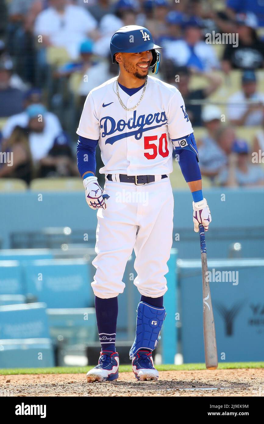 Los Angeles Dodgers right fielder Mookie Betts (50) smiles as he comes ...
