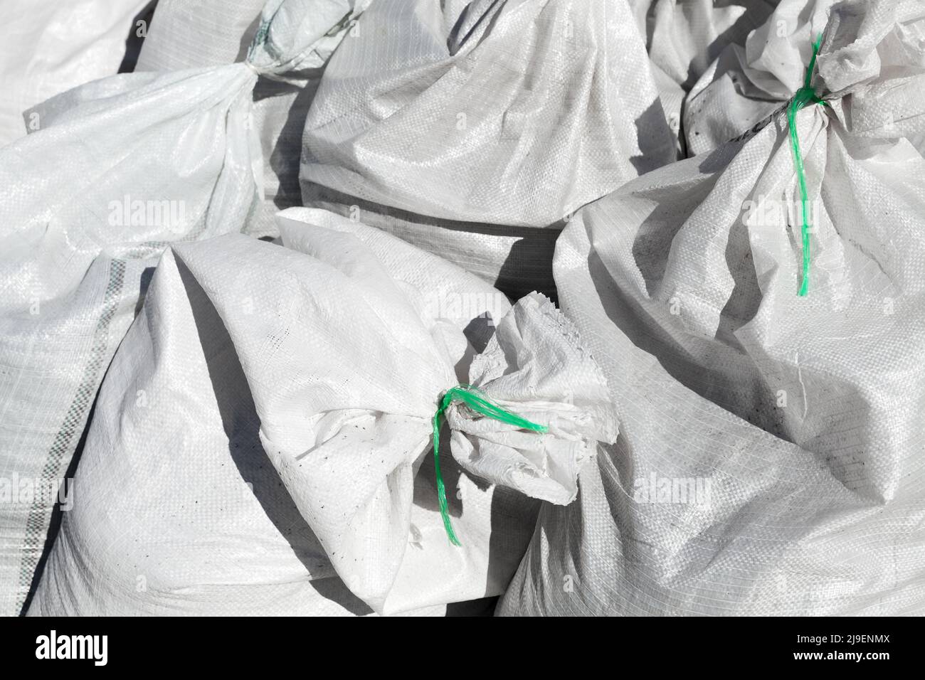 White polypropylene bulk bags, close up, industrial background photo ...