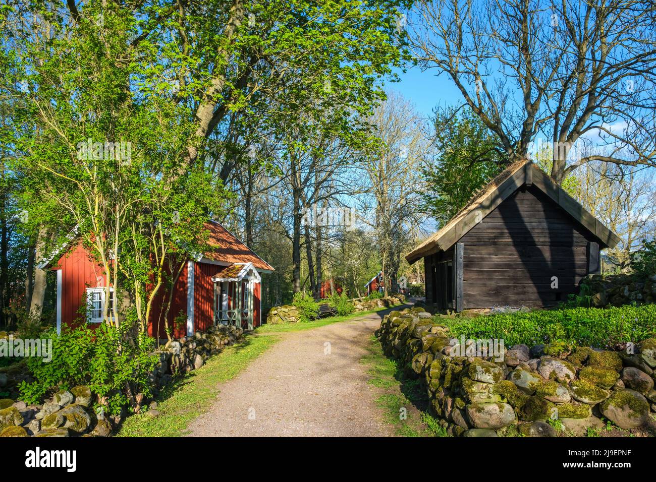 Idyllic red cottage porch hi-res stock photography and images - Alamy