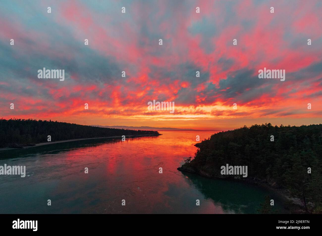 Beautiful sunset with Olympic Mountains in background, Deception Pass ...