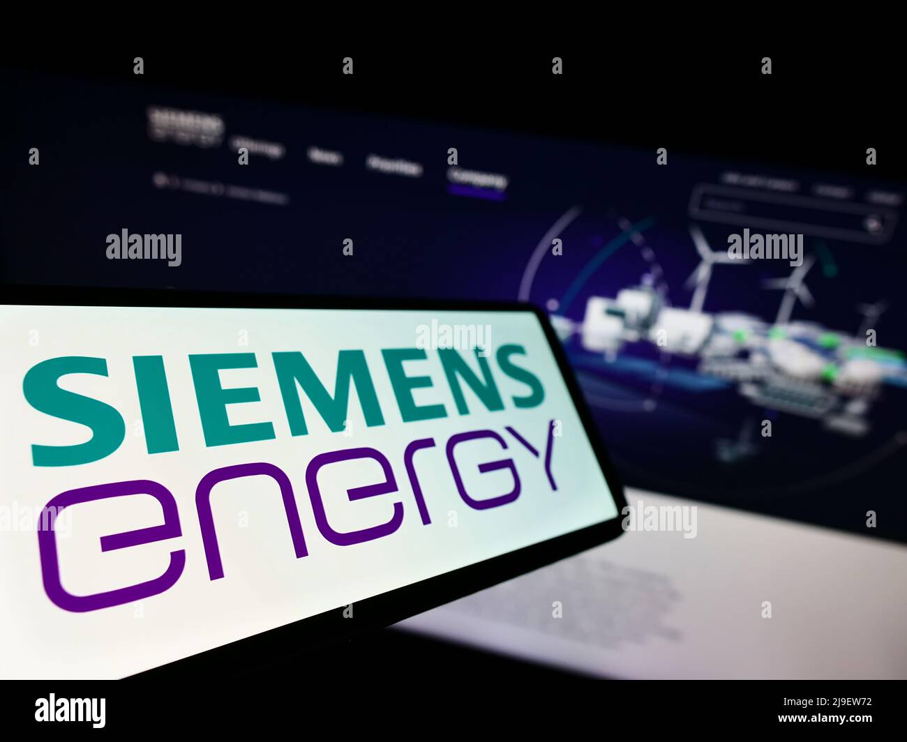Cellphone with logo of German technology company Siemens Energy AG on ...