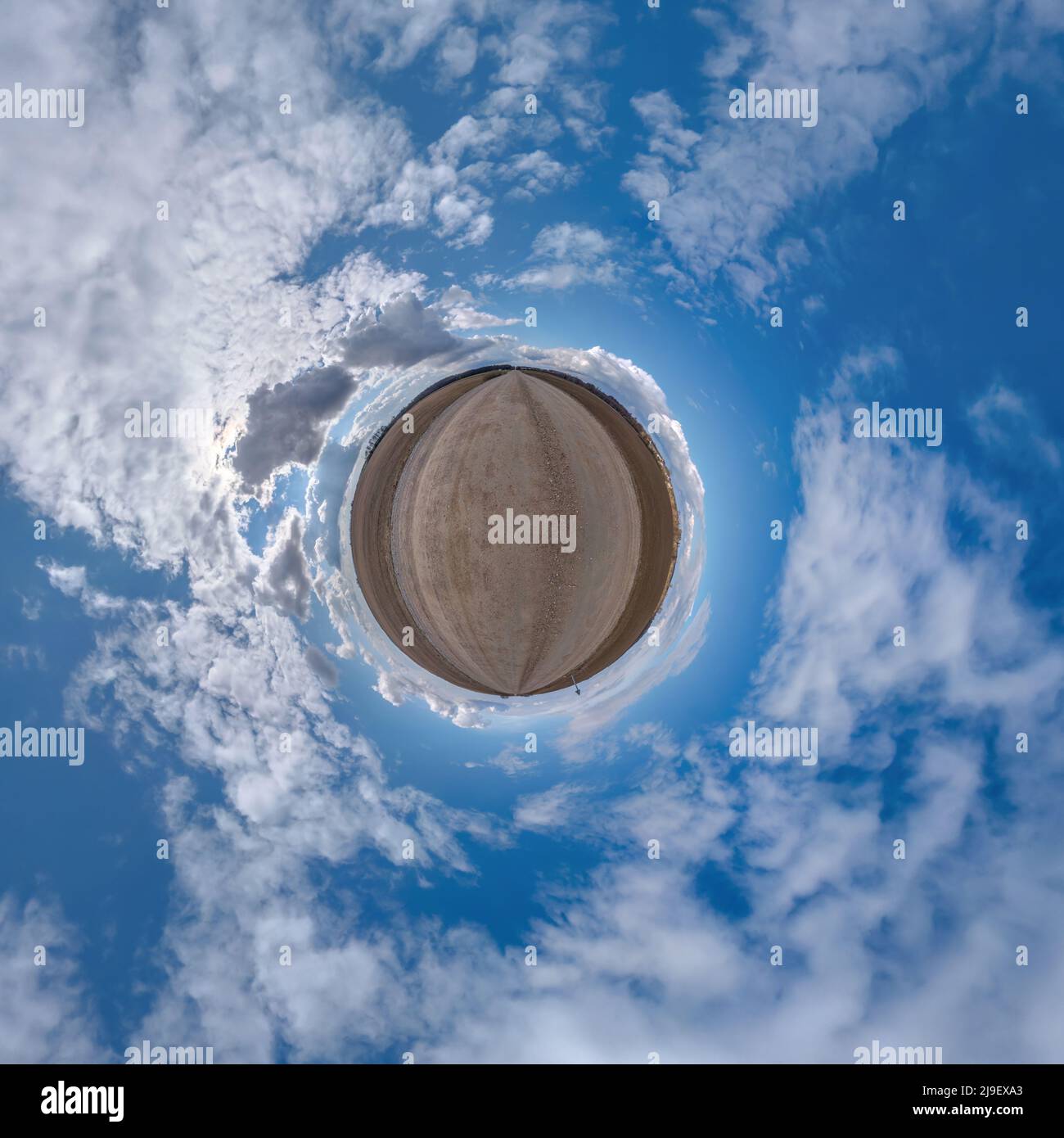 tiny planet in blue sky with beautiful clouds with transformation of ...
