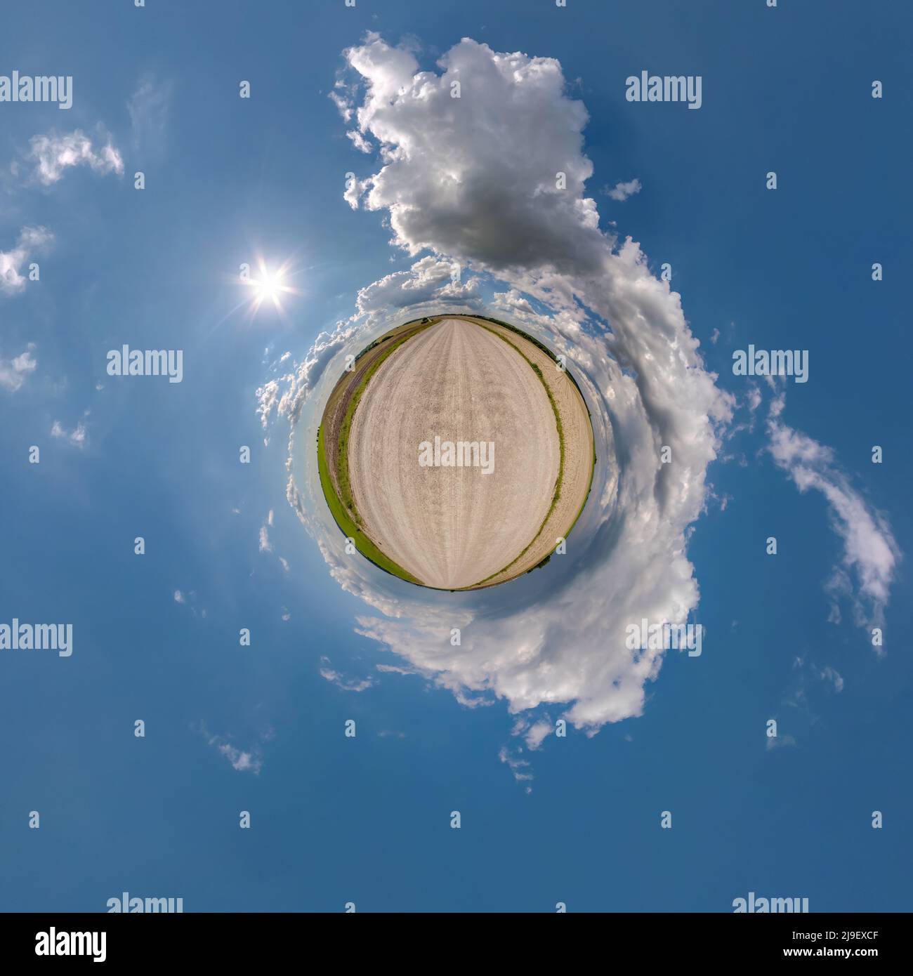 tiny planet in blue sky with beautiful clouds with transformation of ...