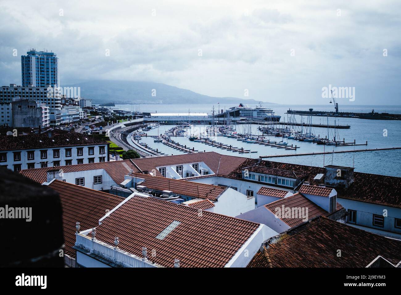 View of rooftops and ocean marina in downtown Ponta Delgada - Azores ...