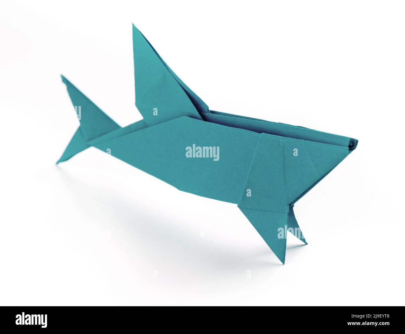 Blue paper shark origami isolated on a blank white background Stock ...