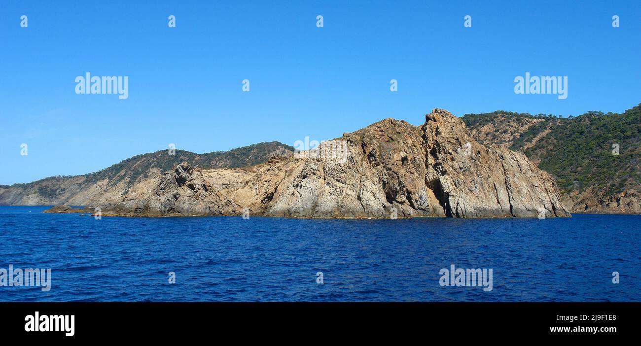 Port Cros island seen from the sea which is part of the Hyeres islands ...