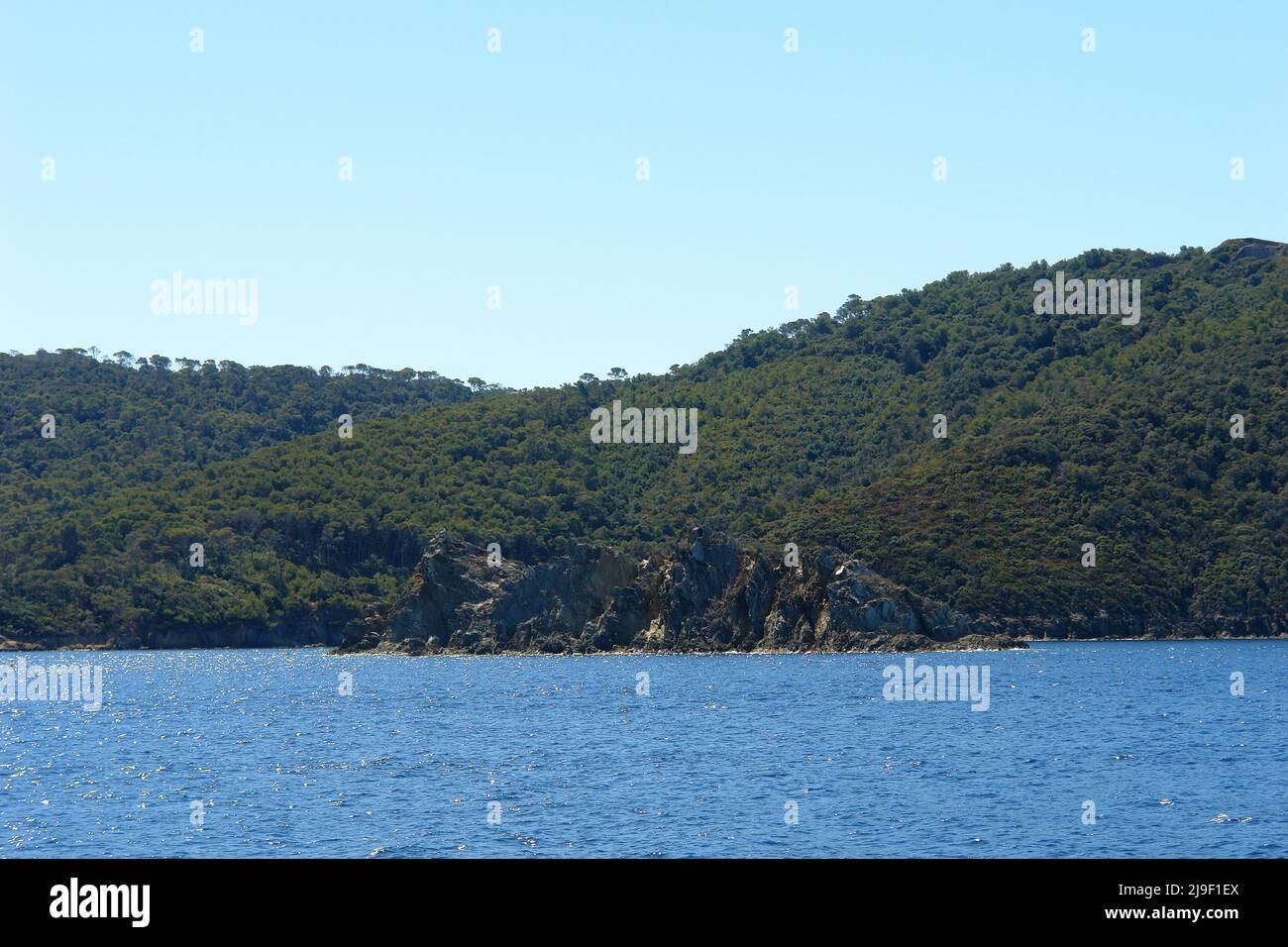 Port Cros island seen from the sea which is part of the Hyeres islands ...