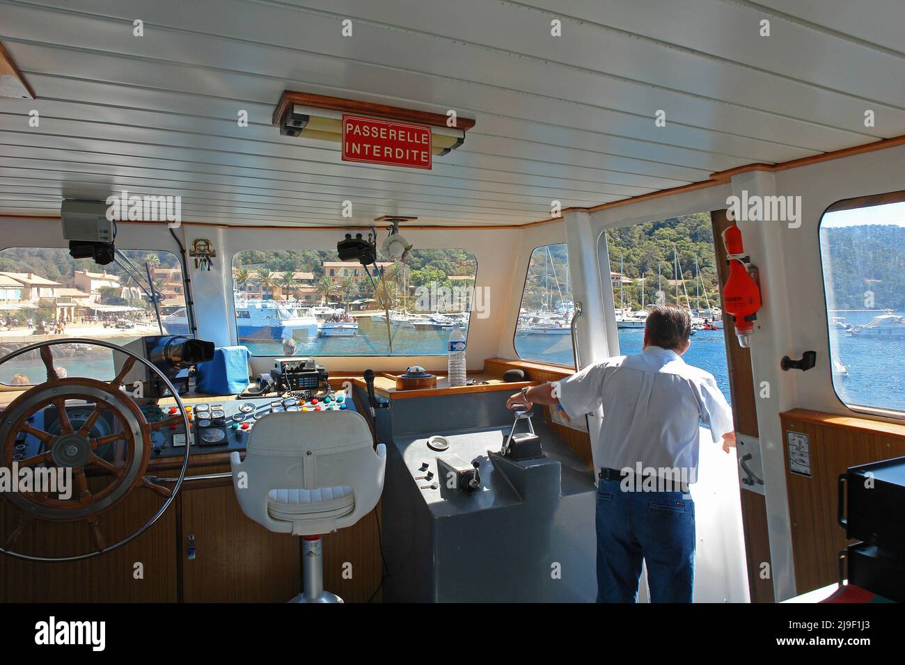 Arrival of the passenger launch Poseidon at the island of Port Cros ...
