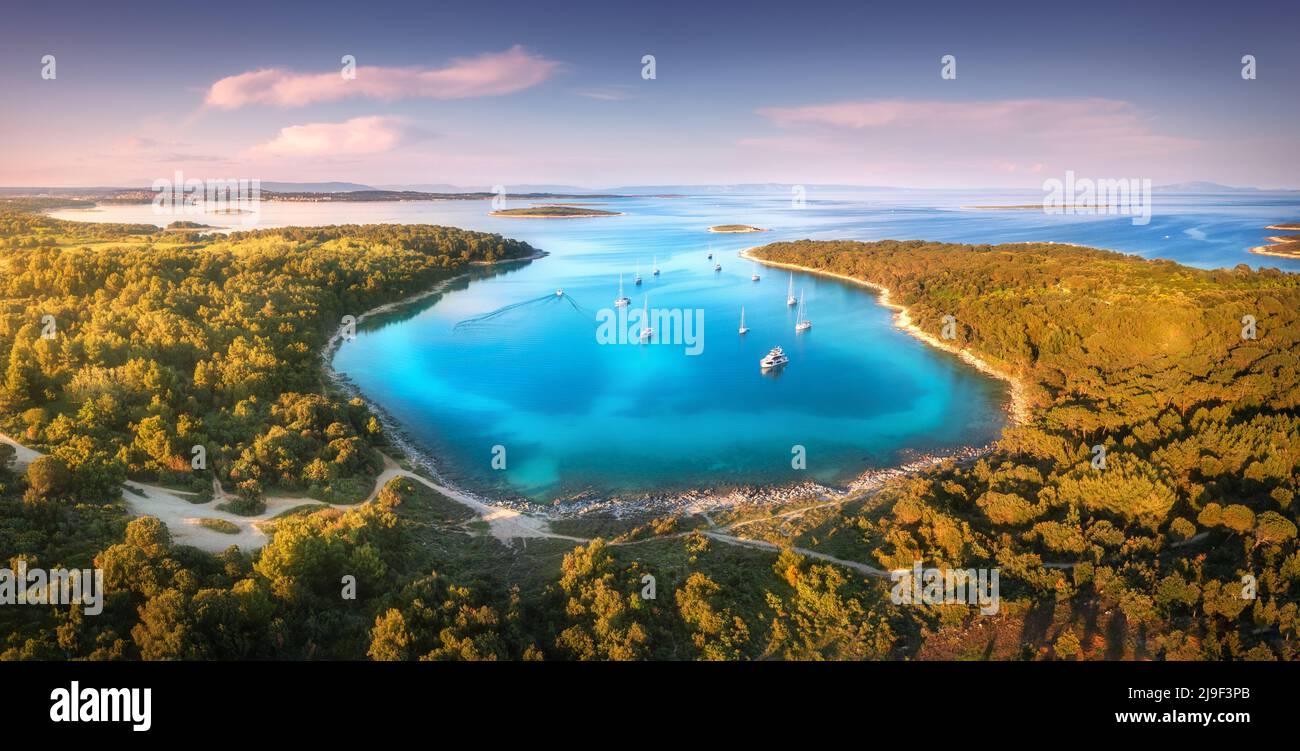 Aerial view of beautiful yachts and boats on the sea at sunset Stock ...