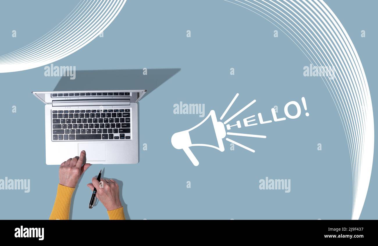 Top view of hands using laptop with symbol of introduction concept ...