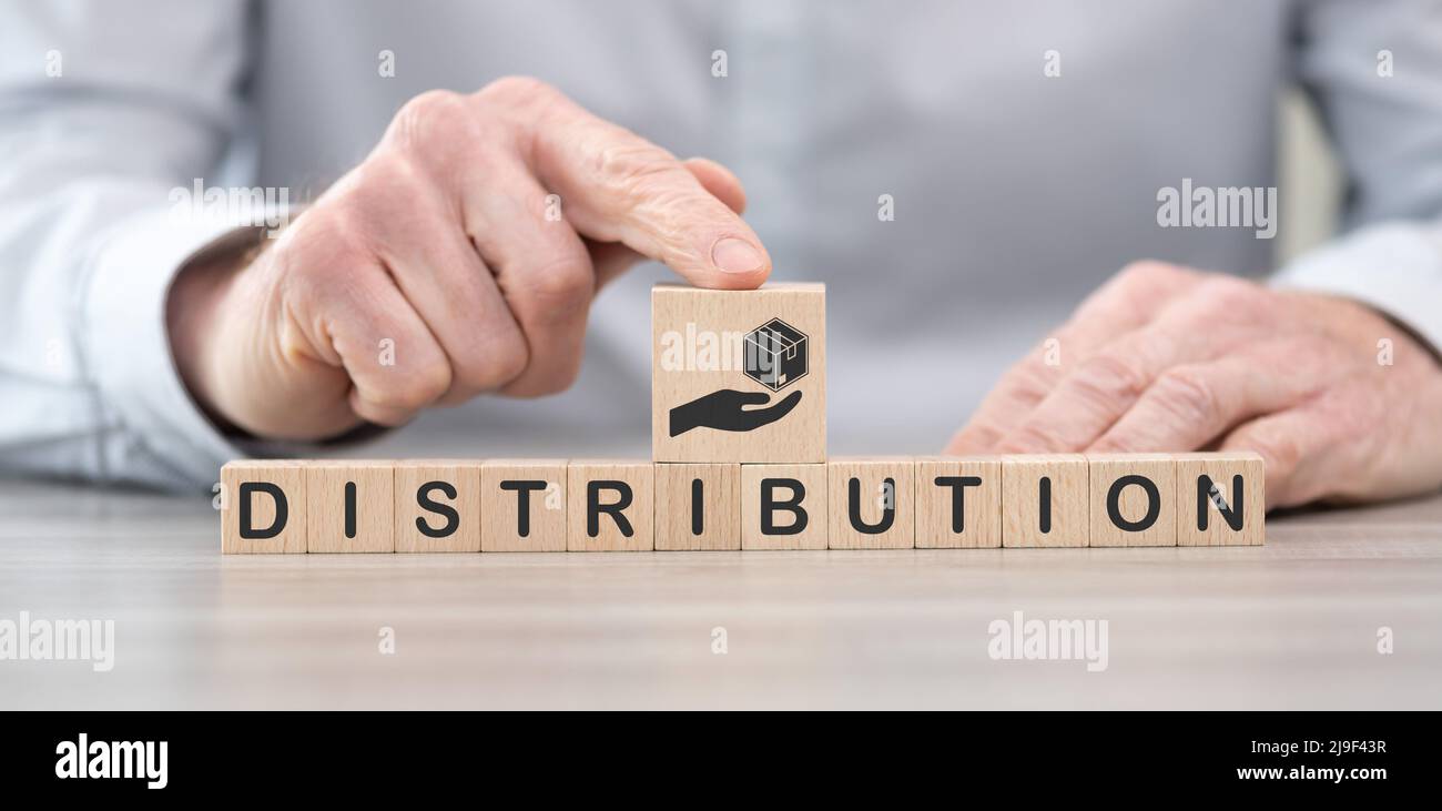 Wooden blocks with symbol of distribution concept Stock Photo - Alamy