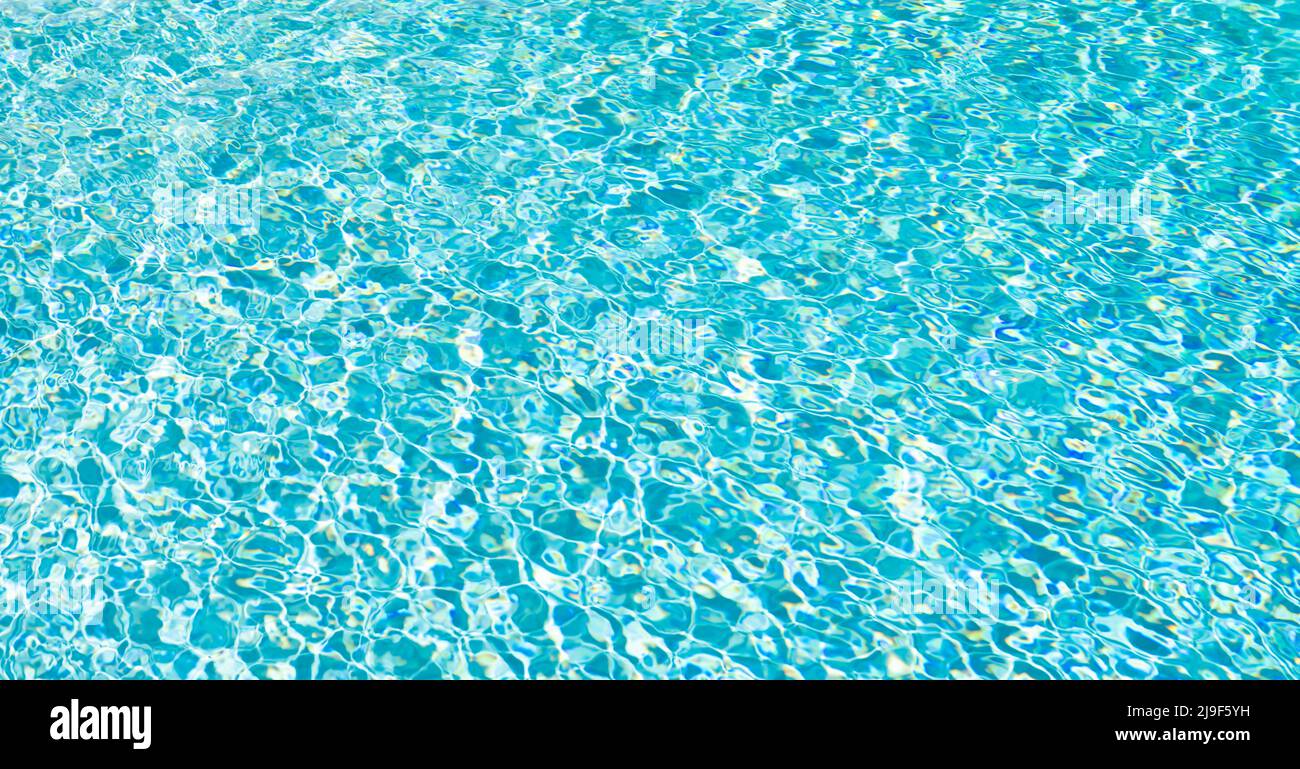 rippled water blue color in summer swimming pool Stock Photo - Alamy
