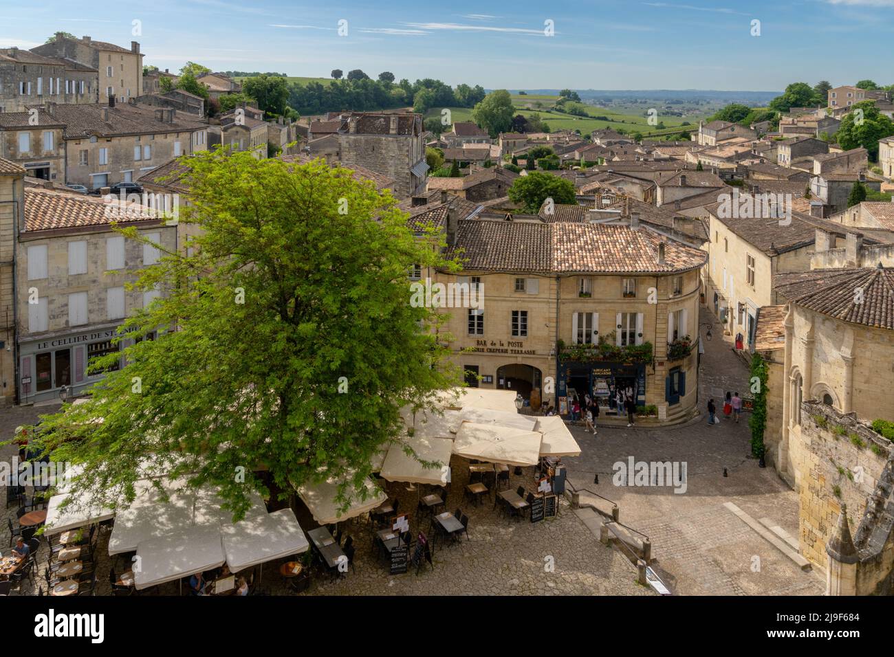 Saint-Emilion, France - 10 May, 2022: village square with shops and ...