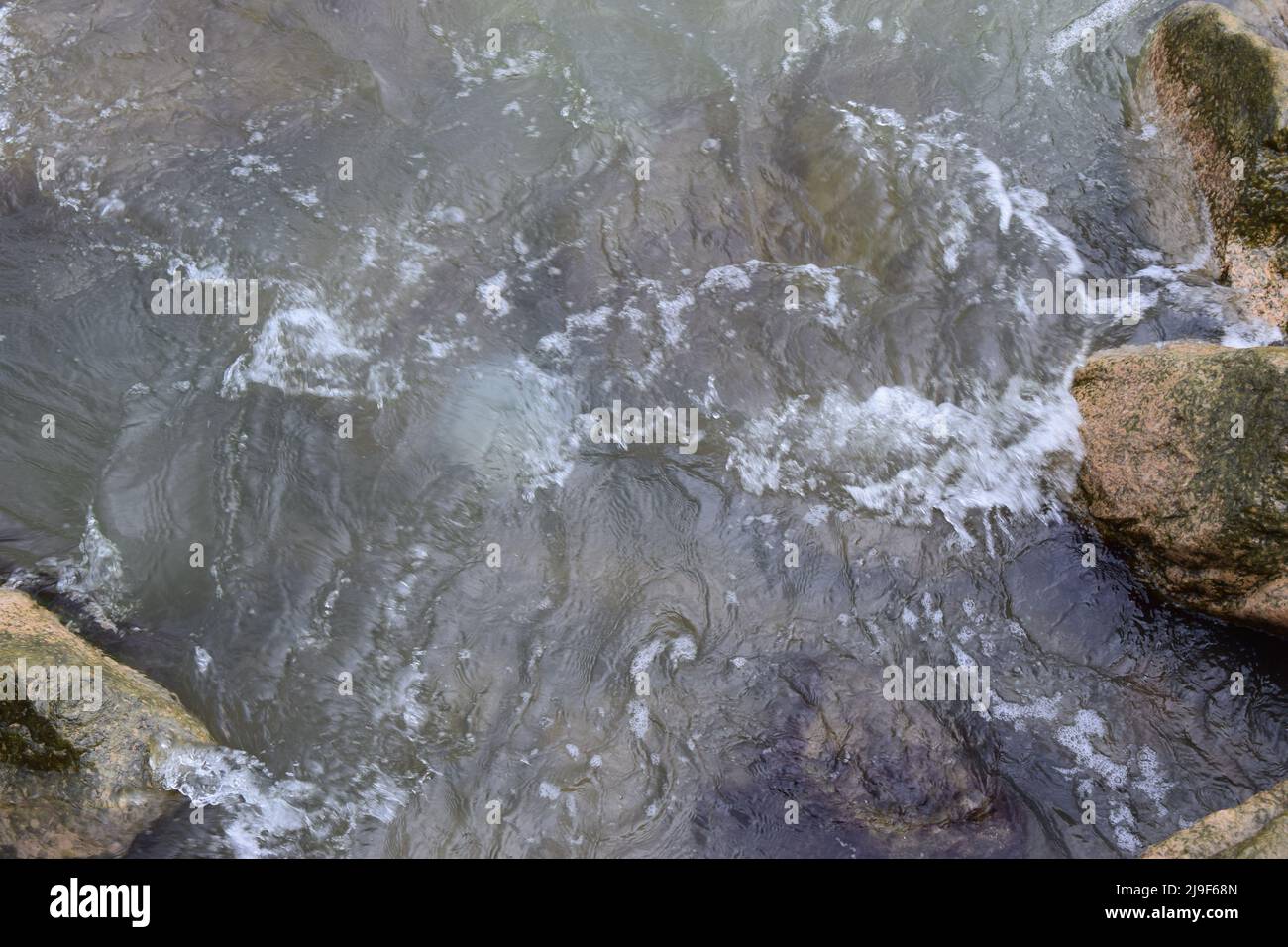 Beating the rock sea wave. Surf, waves, extreme sports Stock Photo - Alamy