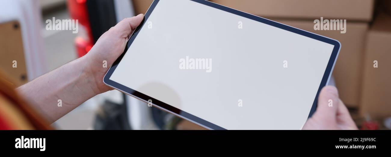 Courier hands hold tablet with blank screen, mocap Stock Photo - Alamy