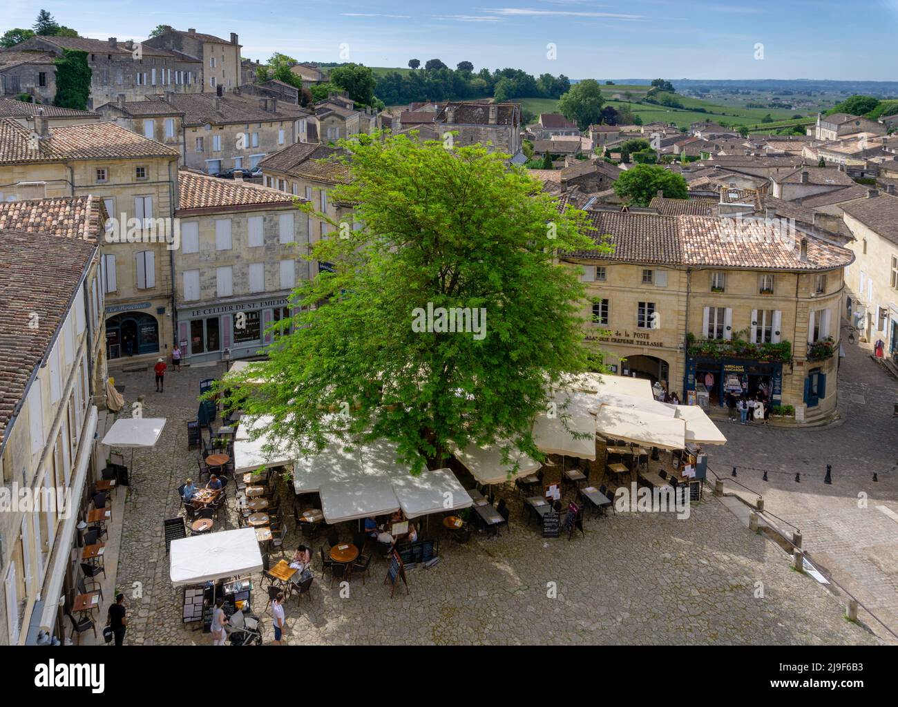 Saint-Emilion, France - 10 May, 2022: village square with shops and ...