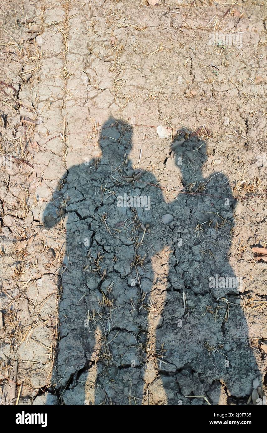 Shadow of two men Stock Photo - Alamy