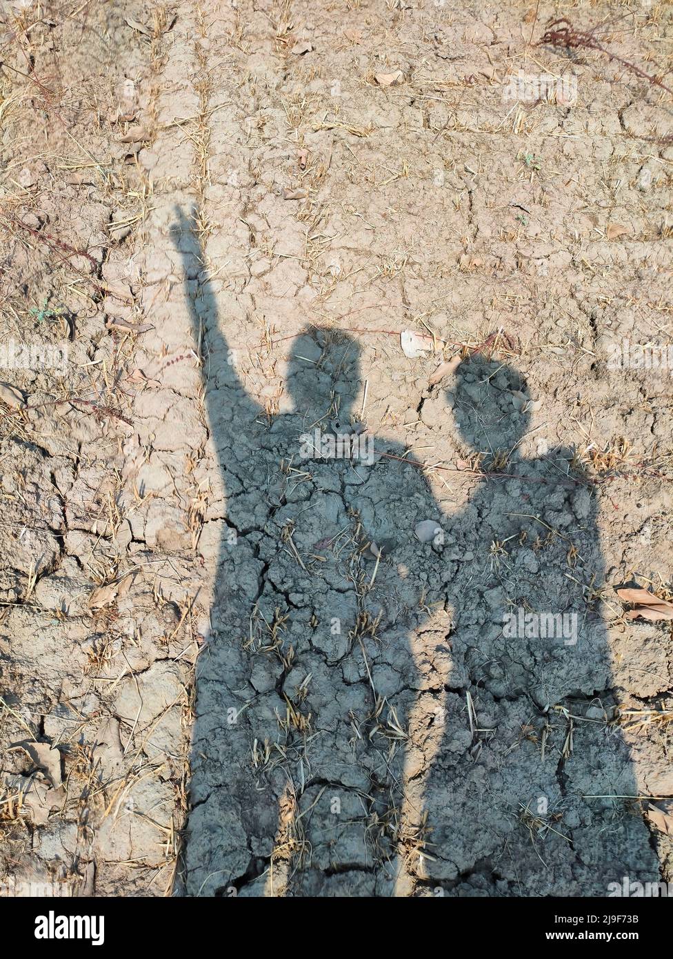 Shadow of two men Stock Photo - Alamy