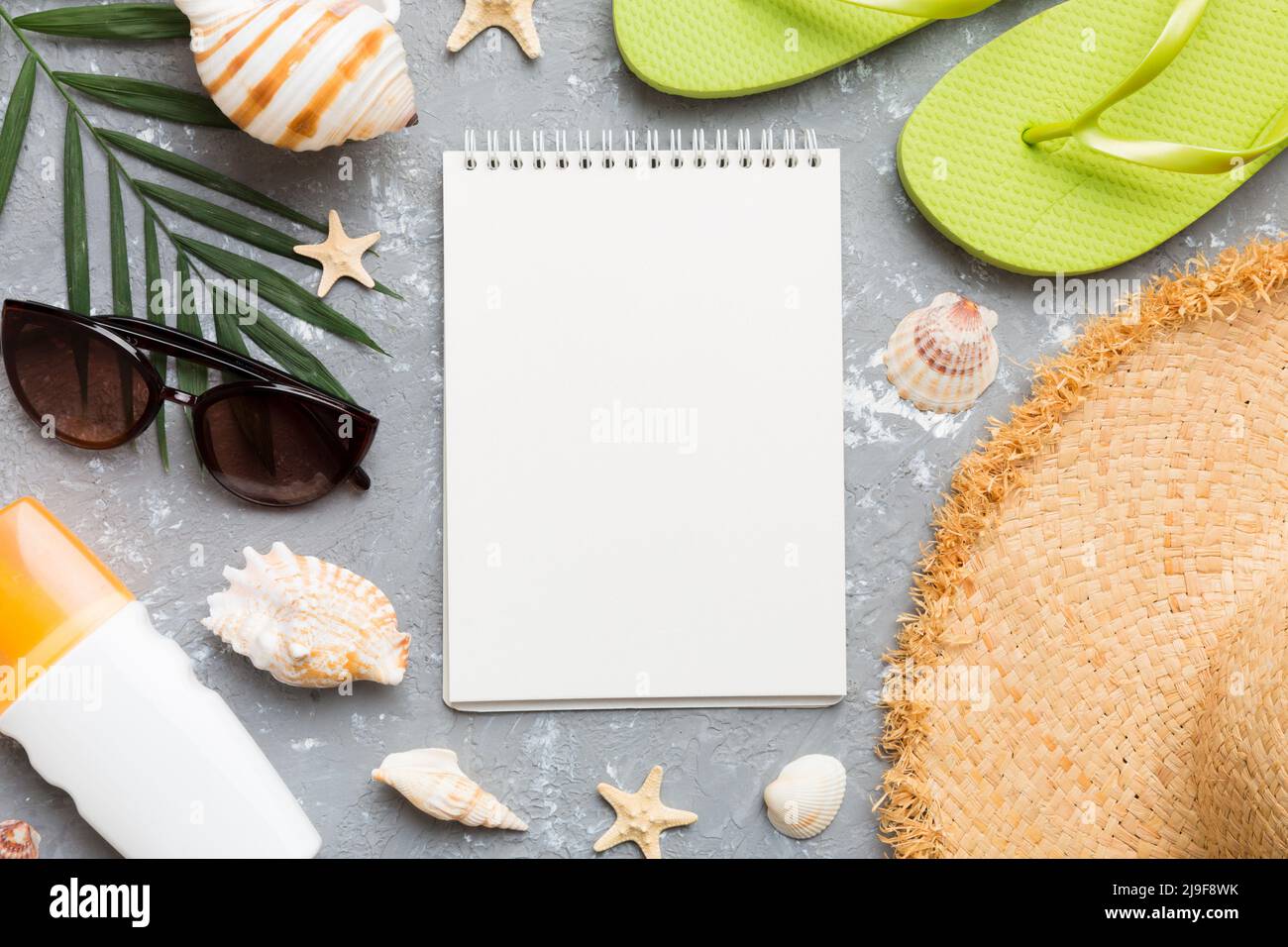 Blank writing book with summer beach accessories on background, copy ...