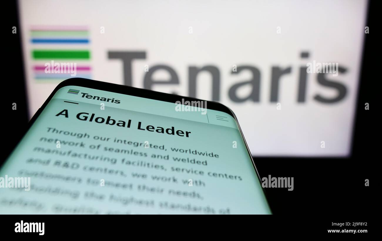 Mobile phone with website of steel pipe company Tenaris S.A. on screen ...