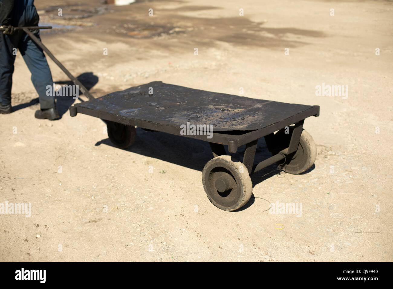 Truck for cargo. Transporter of goods. Warehouse tools. Wheelbarrow for ...