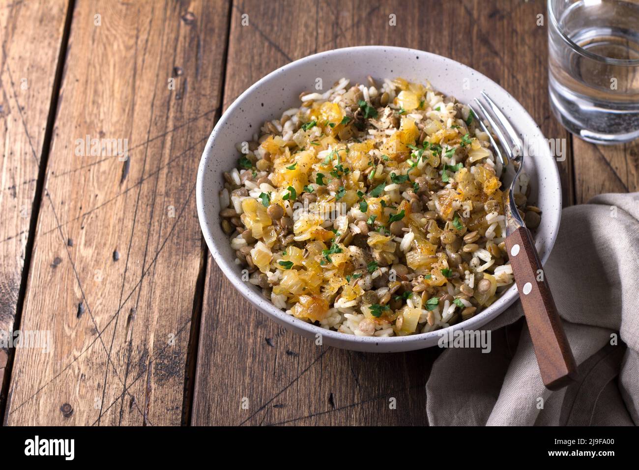 Traditional Middle Eastern dish, Mujadara of lentils, rice and fried ...