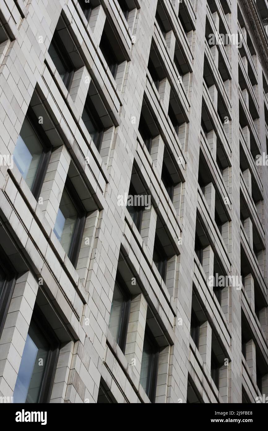A tall skyscraper in downtown Chicago with lots of windows Stock Photo ...