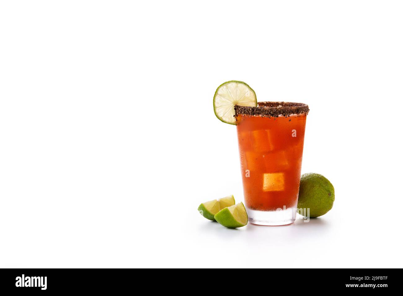 Homemade michelada cocktail with beer salted Rim and tomato juice ...