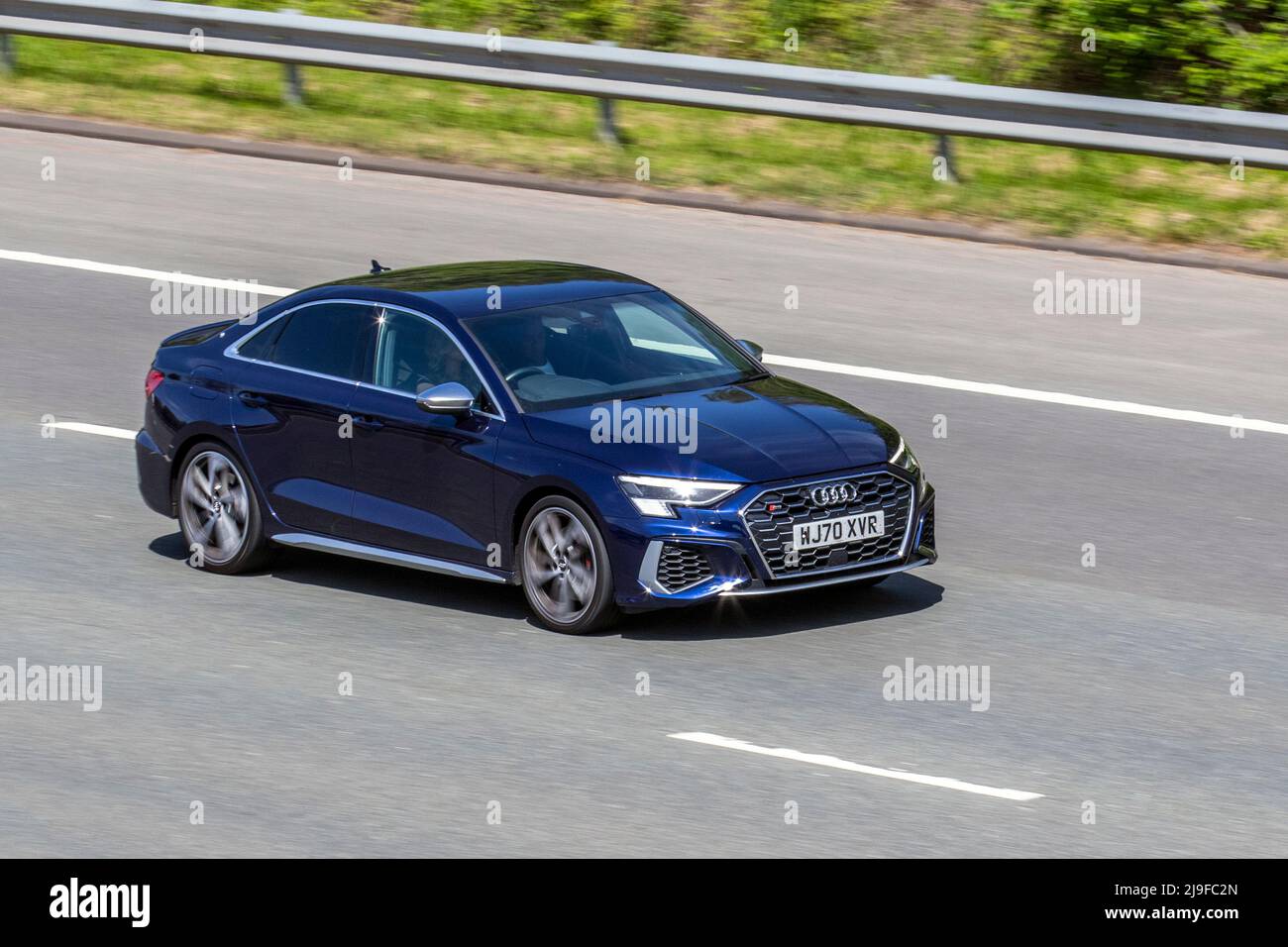 2020 blue Audi S3 TFSI QUATTRO S-A 4dr; driving on the M61 Motorway ...