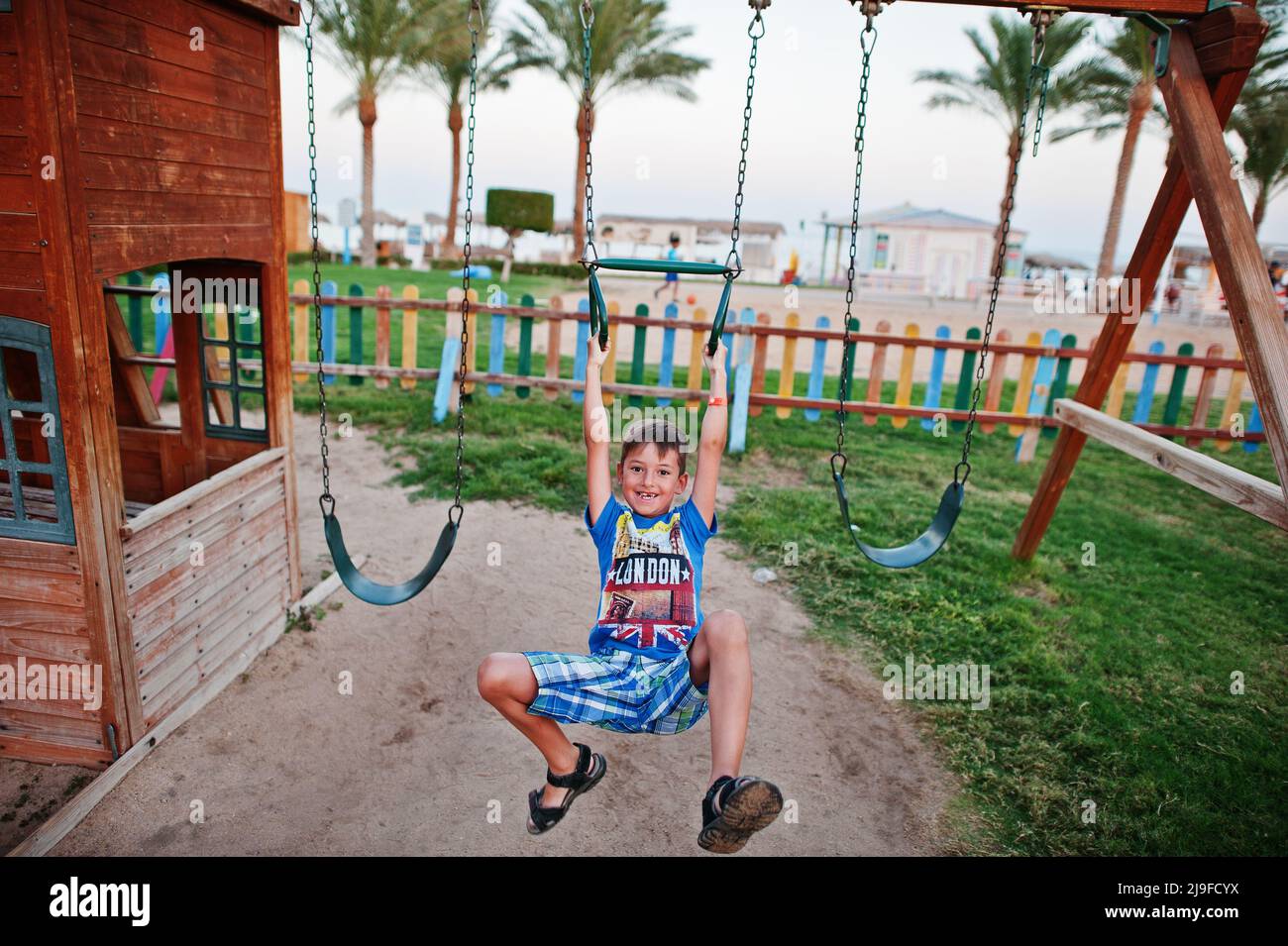 Boy at playground of egyptian resort Stock Photo - Alamy